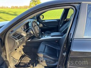Black BMW X6 2014 in Ogre, with an engine capacity of 3.00 L and mileage of 212 thousand km for 13700 €, photo 12 on AUTOMOTO.COM.LV