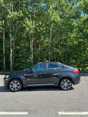 Black BMW X6 2014 in Parnu, with an engine capacity of 3.00 L and mileage of 298 thousand km for 18900 €, photo  on AUTOMOTO.COM.LV