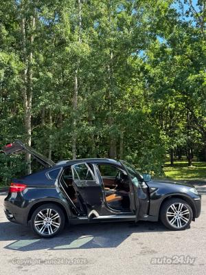 Black BMW X6 2014 in Parnu, with an engine capacity of 3.00 L and mileage of 298 thousand km for 18900 €, photo 8 on AUTOMOTO.COM.LV