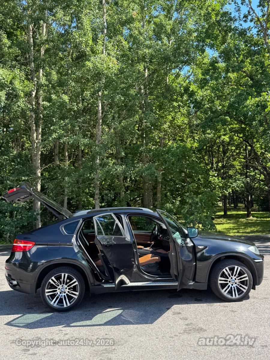 Black BMW X6 2014 in Parnu, with an engine capacity of 3.00 L and mileage of 298 thousand km for 18900 €, photo 8 on AUTOMOTO.COM.LV