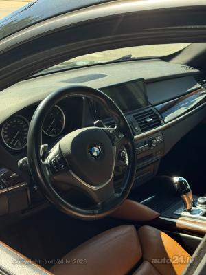 Black BMW X6 2014 in Parnu, with an engine capacity of 3.00 L and mileage of 298 thousand km for 18900 €, photo 11 on AUTOMOTO.COM.LV
