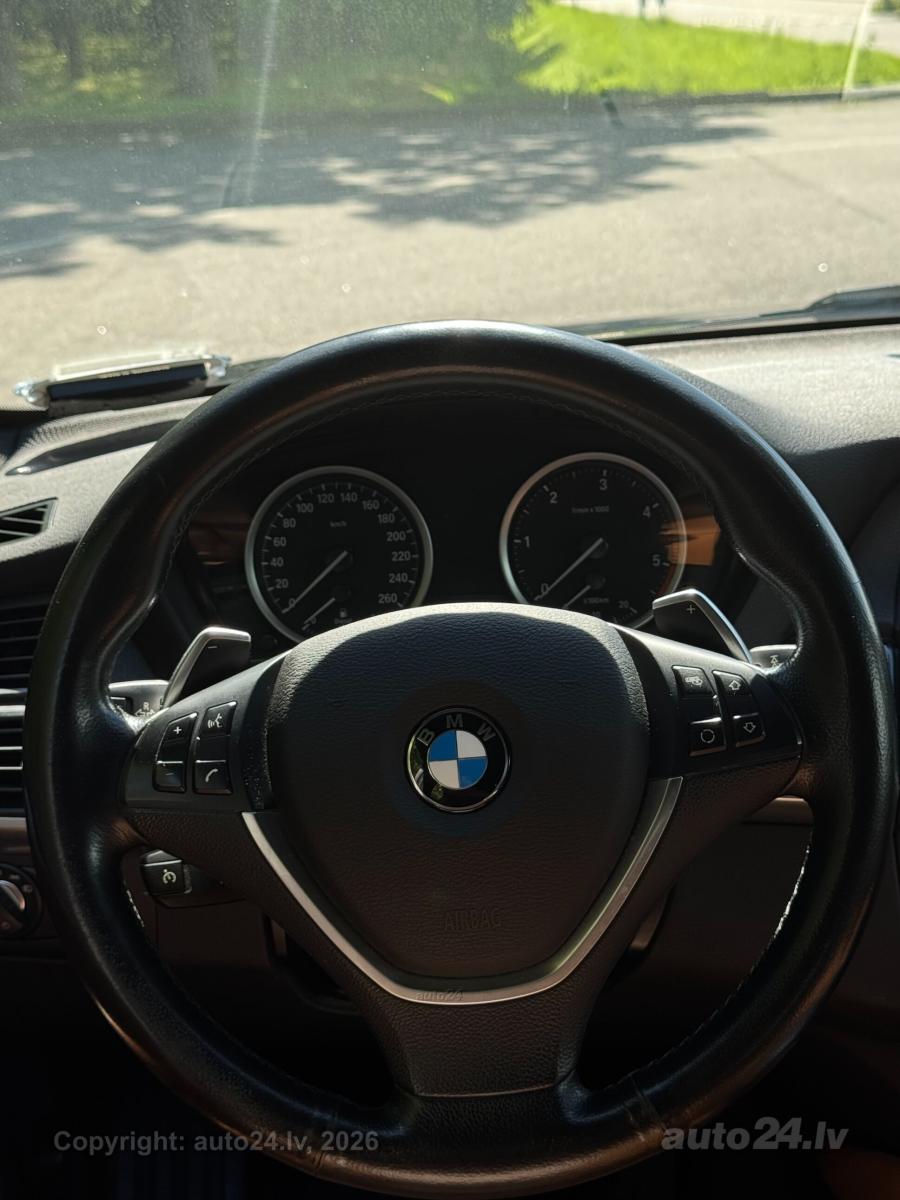 Black BMW X6 2014 in Parnu, with an engine capacity of 3.00 L and mileage of 298 thousand km for 18900 €, photo 12 on AUTOMOTO.COM.LV