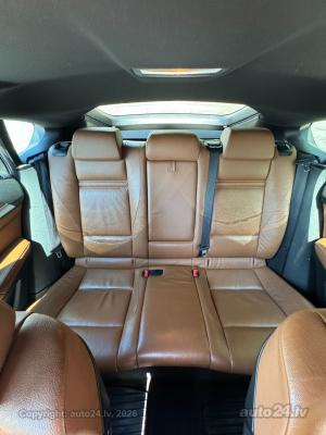 Black BMW X6 2014 in Parnu, with an engine capacity of 3.00 L and mileage of 298 thousand km for 18900 €, photo 14 on AUTOMOTO.COM.LV