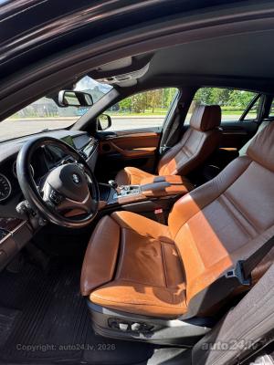 Black BMW X6 2014 in Parnu, with an engine capacity of 3.00 L and mileage of 298 thousand km for 18900 €, photo 18 on AUTOMOTO.COM.LV