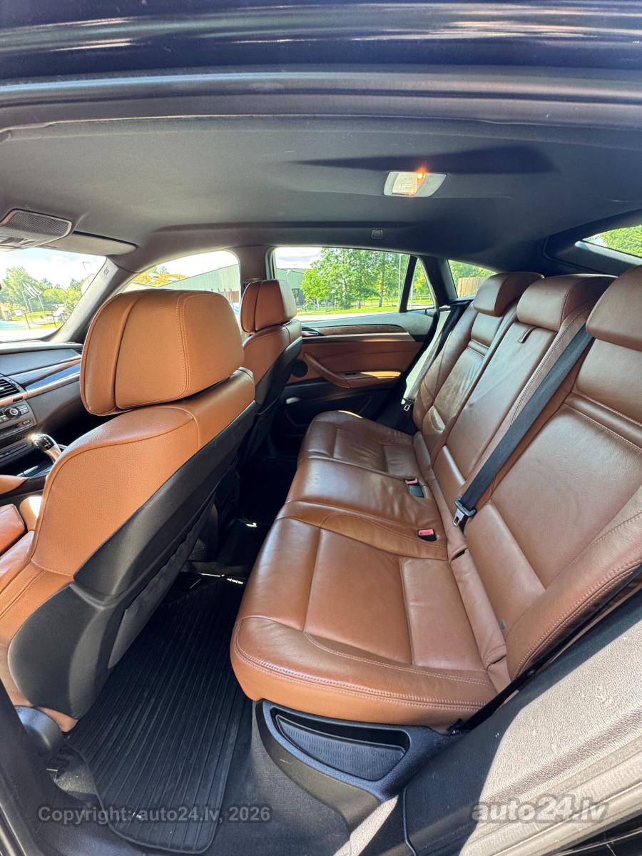 Black BMW X6 2014 in Parnu, with an engine capacity of 3.00 L and mileage of 298 thousand km for 18900 €, photo 19 on AUTOMOTO.COM.LV