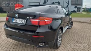 Black BMW X6 2014 in Riga, with an engine capacity of 3.00 L and mileage of 199 thousand km for 16500 €, photo 6 on AUTOMOTO.COM.LV