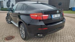 Black BMW X6 2014 in Riga, with an engine capacity of 3.00 L and mileage of 199 thousand km for 16500 €, photo 7 on AUTOMOTO.COM.LV