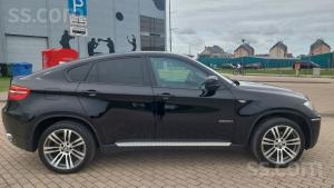 Black BMW X6 2014 in Riga, with an engine capacity of 3.00 L and mileage of 199 thousand km for 16500 €, photo 10 on AUTOMOTO.COM.LV