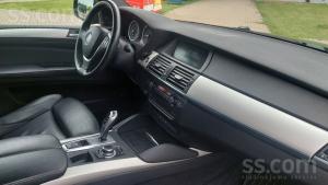 Black BMW X6 2014 in Riga, with an engine capacity of 3.00 L and mileage of 199 thousand km for 16500 €, photo 12 on AUTOMOTO.COM.LV