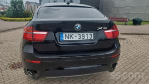 Black BMW X6 2014 in Riga, with an engine capacity of 3.00 L and mileage of 199 thousand km for 16500 €, photo 15 on AUTOMOTO.COM.LV