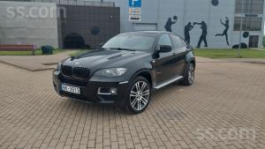 Black BMW X6 2014 in Riga, with an engine capacity of 3.00 L and mileage of 199 thousand km for 16500 €, photo 19 on AUTOMOTO.COM.LV