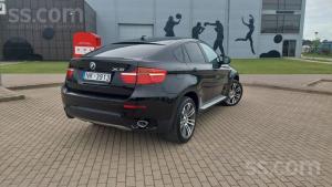 Black BMW X6 2014 in Riga, with an engine capacity of 3.00 L and mileage of 199 thousand km for 16500 €, photo 22 on AUTOMOTO.COM.LV
