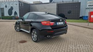 Black BMW X6 2014 in Riga, with an engine capacity of 3.00 L and mileage of 199 thousand km for 16500 €, photo 23 on AUTOMOTO.COM.LV