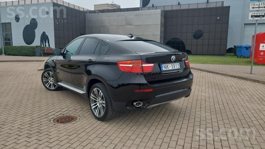 Black BMW X6 2014 in Riga, with an engine capacity of 3.00 L and mileage of 199 thousand km for 16500 €, photo 23 on AUTOMOTO.COM.LV