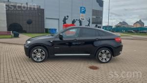 Black BMW X6 2014 in Riga, with an engine capacity of 3.00 L and mileage of 199 thousand km for 16500 €, photo 27 on AUTOMOTO.COM.LV