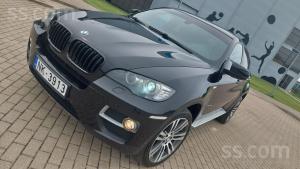 Black BMW X6 2014 in Riga, with an engine capacity of 3.00 L and mileage of 199 thousand km for 16500 €, photo 30 on AUTOMOTO.COM.LV