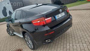 Black BMW X6 2014 in Riga, with an engine capacity of 3.00 L and mileage of 199 thousand km for 16500 €, photo 31 on AUTOMOTO.COM.LV