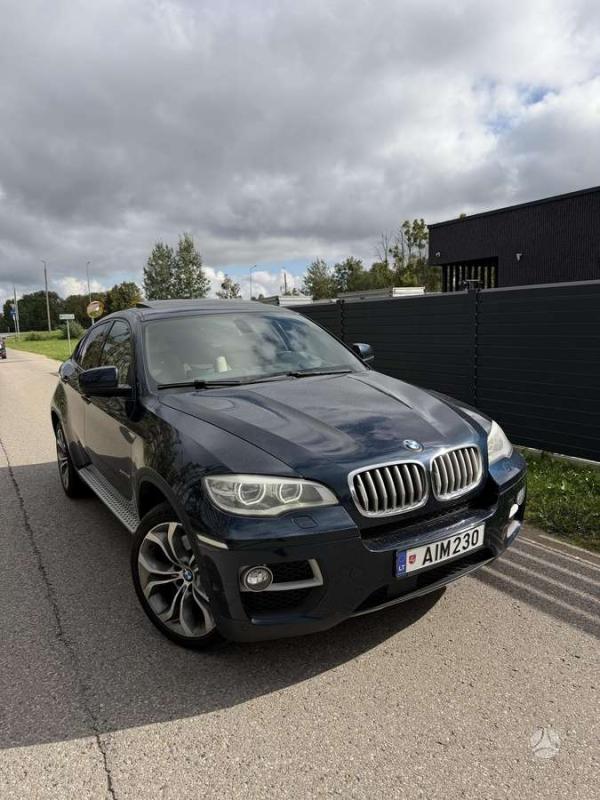 Black BMW X6 2014 in Kaunas, with an engine capacity of 4.40 L and mileage of 245 thousand km for 6660 €, photo 3 on AUTOMOTO.COM.LV