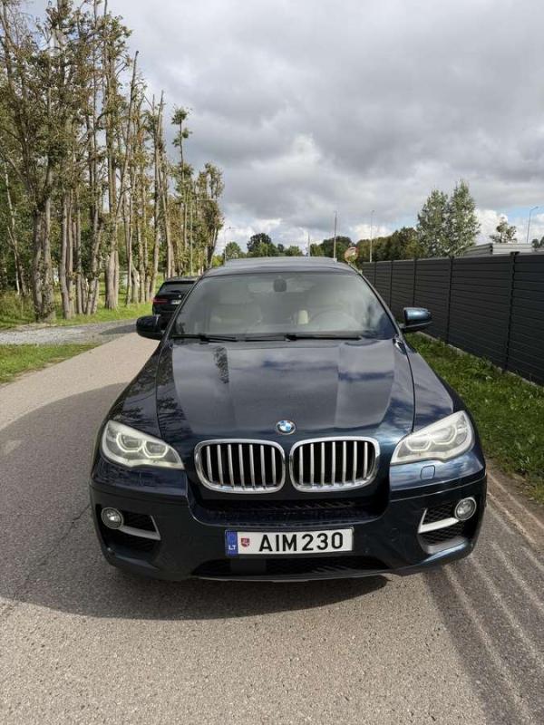 Black BMW X6 2014 in Kaunas, with an engine capacity of 4.40 L and mileage of 245 thousand km for 6660 €, photo 5 on AUTOMOTO.COM.LV
