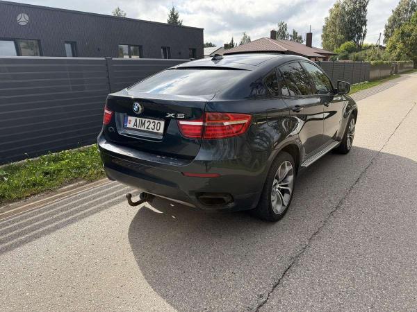 Black BMW X6 2014 in Kaunas, with an engine capacity of 4.40 L and mileage of 245 thousand km for 6660 €, photo 7 on AUTOMOTO.COM.LV