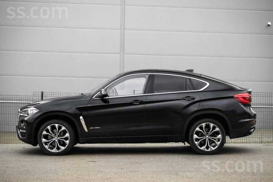 Black BMW X6 2015 in Tukums, with an engine capacity of 3.00 L and mileage of 198 thousand km for 14950 €, photo 3 on AUTOMOTO.COM.LV