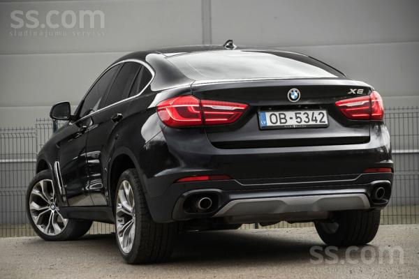 Black BMW X6 2015 in Tukums, with an engine capacity of 3.00 L and mileage of 198 thousand km for 14950 €, photo 7 on AUTOMOTO.COM.LV