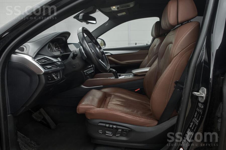Black BMW X6 2015 in Tukums, with an engine capacity of 3.00 L and mileage of 198 thousand km for 14950 €, photo 17 on AUTOMOTO.COM.LV