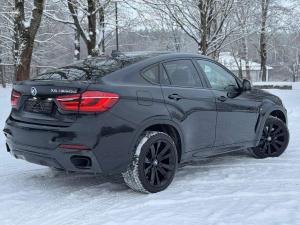 Black BMW X6 2015 in Siauliai, with an engine capacity of 3.00 L and mileage of 197 thousand km for 23900 €, photo 3 on AUTOMOTO.COM.LV