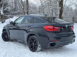 Black BMW X6 2015 in Siauliai, with an engine capacity of 3.00 L and mileage of 197 thousand km for 23900 €, photo 4 on AUTOMOTO.COM.LV