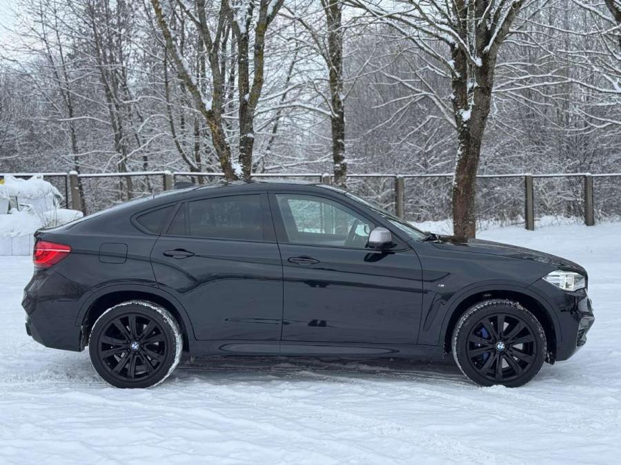 Black BMW X6 2015 in Siauliai, with an engine capacity of 3.00 L and mileage of 197 thousand km for 23900 €, photo 6 on AUTOMOTO.COM.LV