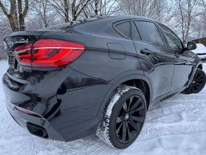 Black BMW X6 2015 in Siauliai, with an engine capacity of 3.00 L and mileage of 197 thousand km for 23900 €, photo 10 on AUTOMOTO.COM.LV