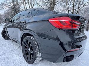 Black BMW X6 2015 in Siauliai, with an engine capacity of 3.00 L and mileage of 197 thousand km for 23900 €, photo 11 on AUTOMOTO.COM.LV