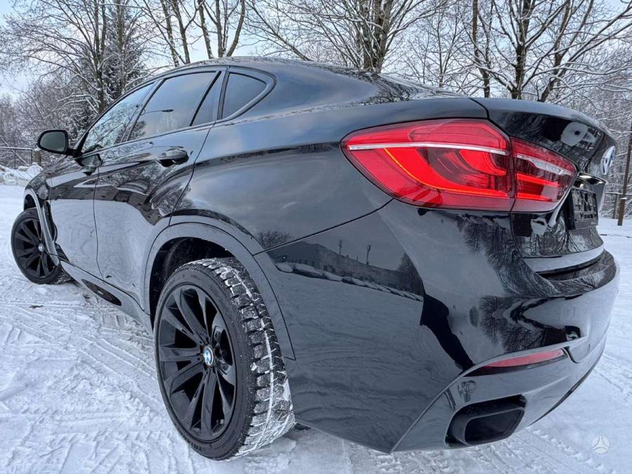 Black BMW X6 2015 in Siauliai, with an engine capacity of 3.00 L and mileage of 197 thousand km for 23900 €, photo 11 on AUTOMOTO.COM.LV