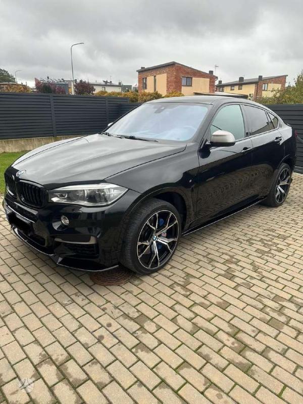 Black BMW X6 2015 in Kaunas, with an engine capacity of 3.00 L and mileage of 280 thousand km for 24900 €, photo 3 on AUTOMOTO.COM.LV