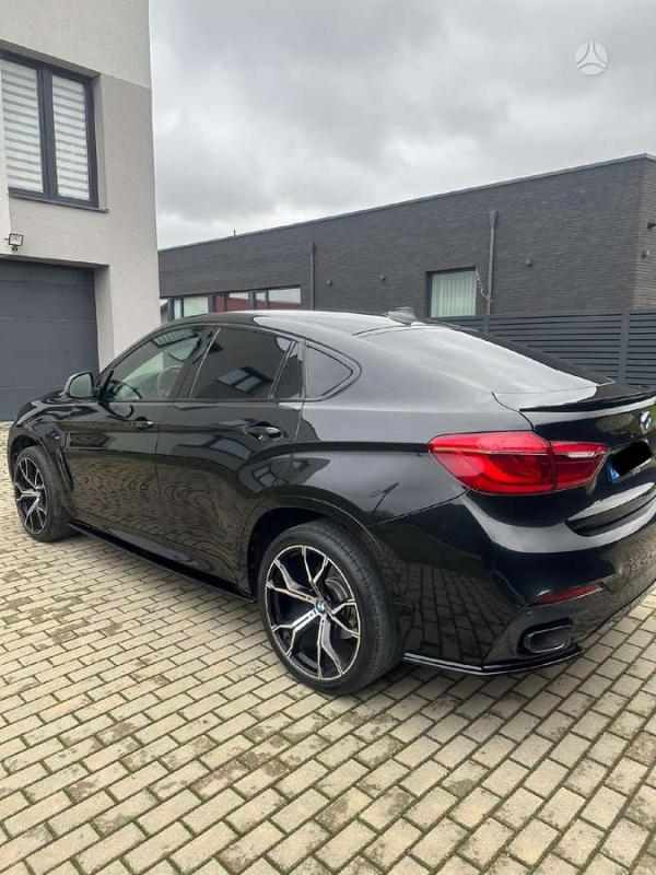 Black BMW X6 2015 in Kaunas, with an engine capacity of 3.00 L and mileage of 280 thousand km for 24900 €, photo 9 on AUTOMOTO.COM.LV