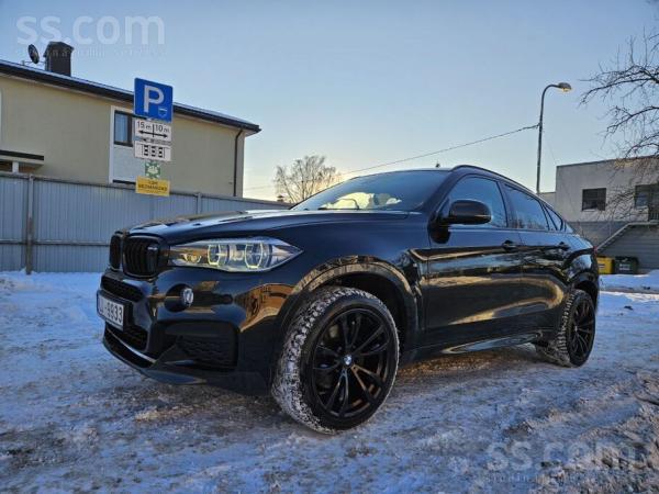 Black BMW X6 2015 in Riga, with an engine capacity of 3.00 L and mileage of 0 thousand km for 22900 €, photo 3 on AUTOMOTO.COM.LV