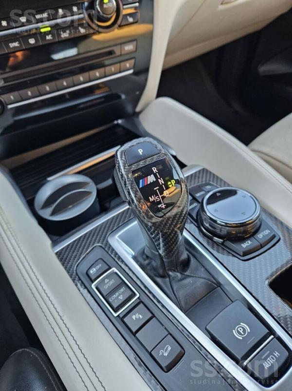 Black BMW X6 2015 in Riga, with an engine capacity of 3.00 L and mileage of 0 thousand km for 22900 €, photo 6 on AUTOMOTO.COM.LV