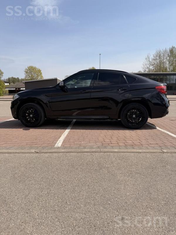 Black BMW X6 2015 in Talsi, with an engine capacity of 3.00 L and mileage of 205 thousand km for 26000 €, photo 8 on AUTOMOTO.COM.LV