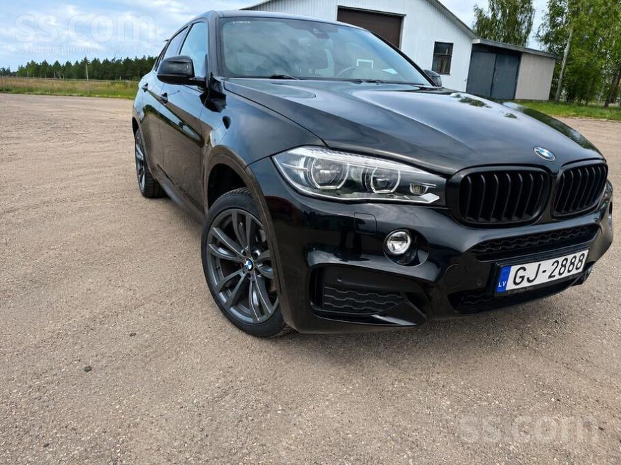 Black BMW X6 2015 in Riga, with an engine capacity of 3.00 L and mileage of 204 thousand km for 26000 €, photo 3 on AUTOMOTO.COM.LV