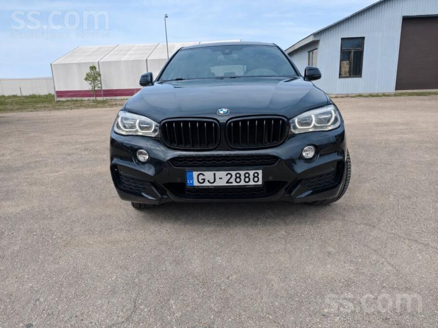 Black BMW X6 2015 in Riga, with an engine capacity of 3.00 L and mileage of 204 thousand km for 26000 €, photo 5 on AUTOMOTO.COM.LV