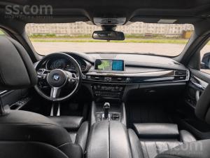 Black BMW X6 2015 in Riga, with an engine capacity of 3.00 L and mileage of 204 thousand km for 26000 €, photo 7 on AUTOMOTO.COM.LV