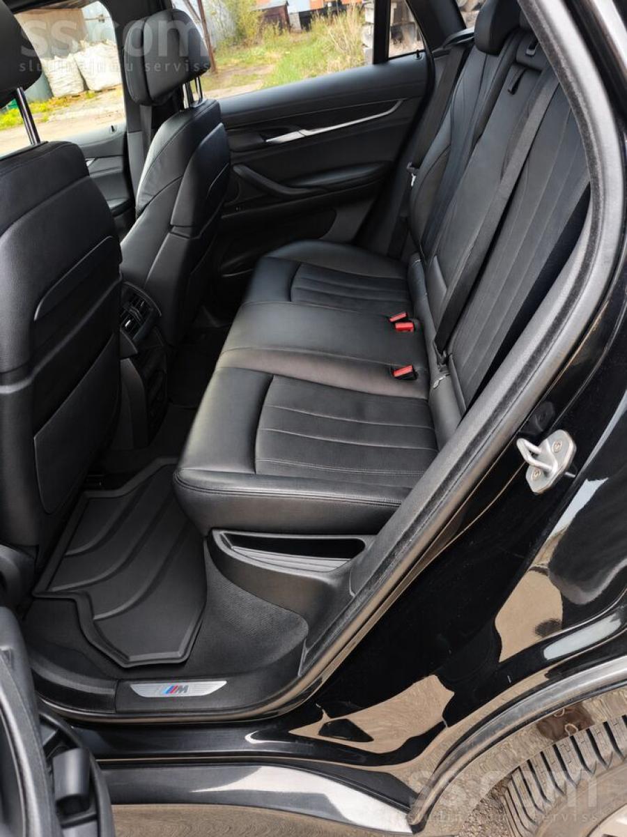 Black BMW X6 2015 in Riga, with an engine capacity of 3.00 L and mileage of 204 thousand km for 26000 €, photo 13 on AUTOMOTO.COM.LV