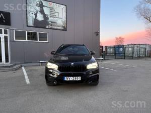 Black BMW X6 2015 in Riga, with an engine capacity of 3.00 L and mileage of 149 thousand km for 30900 €, photo 6 on AUTOMOTO.COM.LV