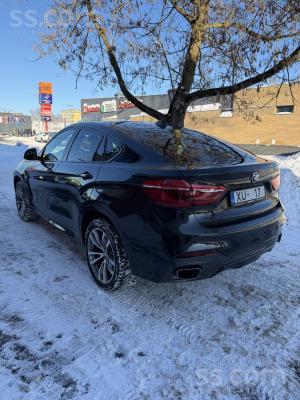 Black BMW X6 2015 in Riga, with an engine capacity of 3.00 L and mileage of 0 thousand km for 21500 €, photo 3 on AUTOMOTO.COM.LV