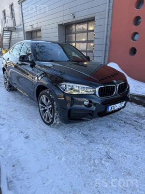 Black BMW X6 2015 in Riga, with an engine capacity of 3.00 L and mileage of 0 thousand km for 21500 €, photo 6 on AUTOMOTO.COM.LV