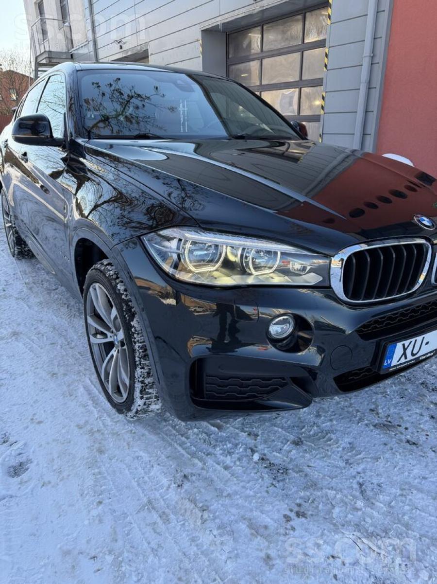 Black BMW X6 2015 in Riga, with an engine capacity of 3.00 L and mileage of 0 thousand km for 21500 €, photo 7 on AUTOMOTO.COM.LV