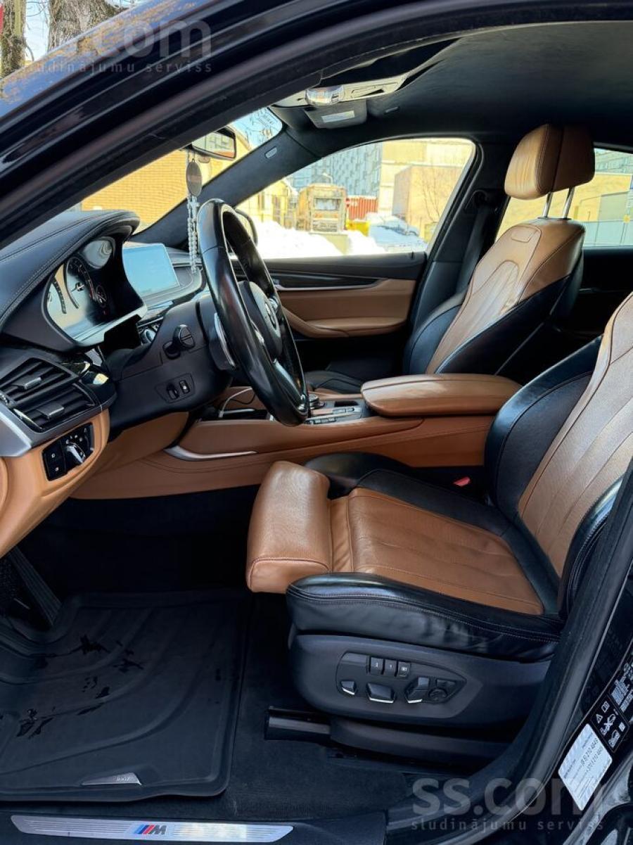 Black BMW X6 2015 in Riga, with an engine capacity of 3.00 L and mileage of 0 thousand km for 21500 €, photo 8 on AUTOMOTO.COM.LV