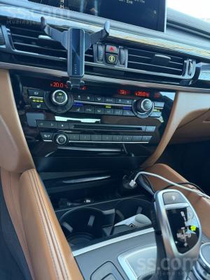 Black BMW X6 2015 in Riga, with an engine capacity of 3.00 L and mileage of 0 thousand km for 21500 €, photo 10 on AUTOMOTO.COM.LV