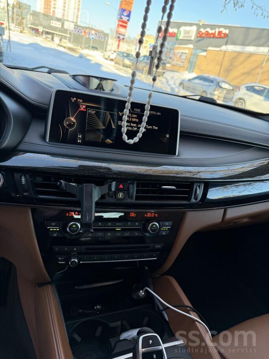 Black BMW X6 2015 in Riga, with an engine capacity of 3.00 L and mileage of 0 thousand km for 21500 €, photo 12 on AUTOMOTO.COM.LV