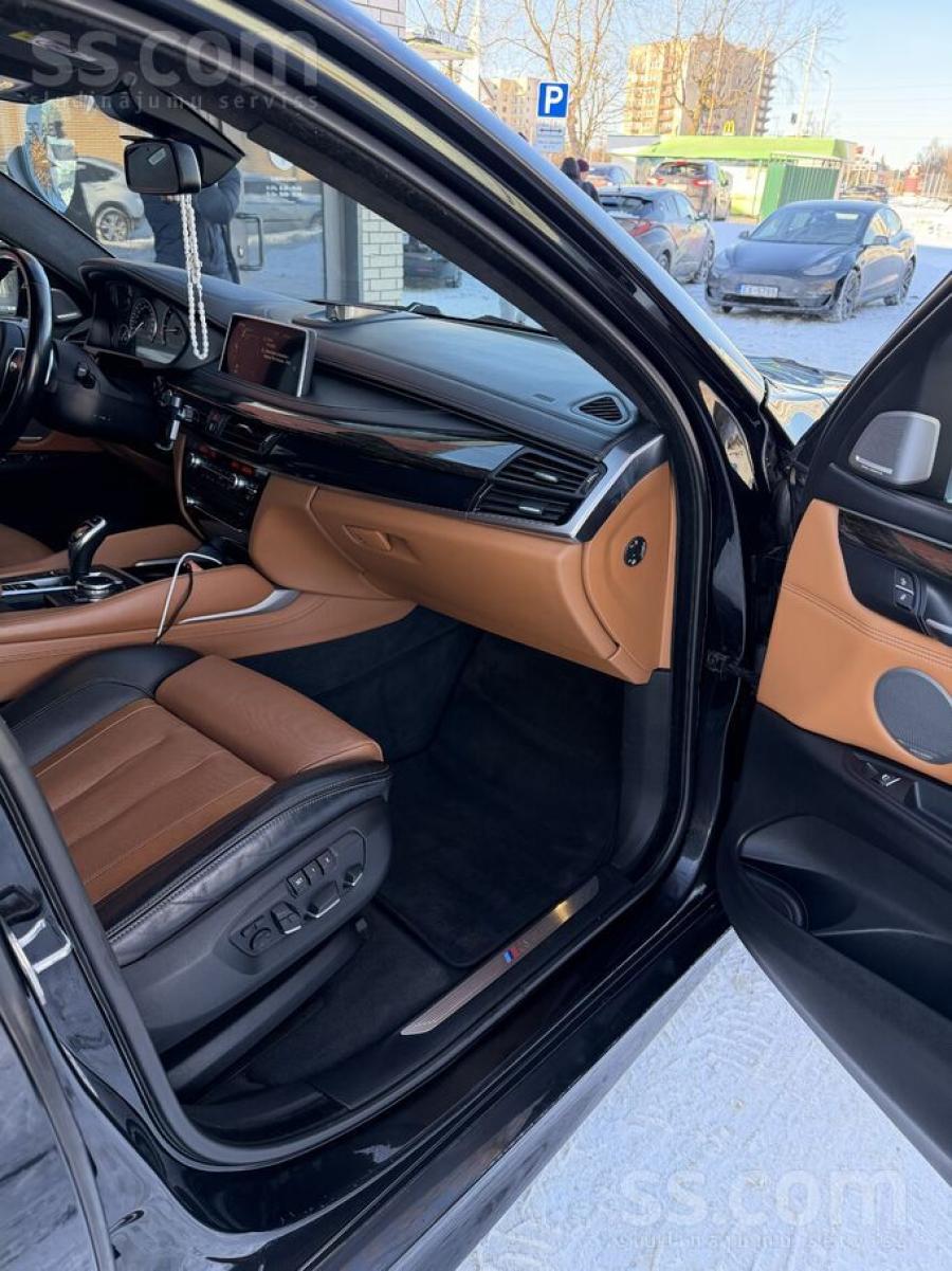 Black BMW X6 2015 in Riga, with an engine capacity of 3.00 L and mileage of 0 thousand km for 21500 €, photo 15 on AUTOMOTO.COM.LV